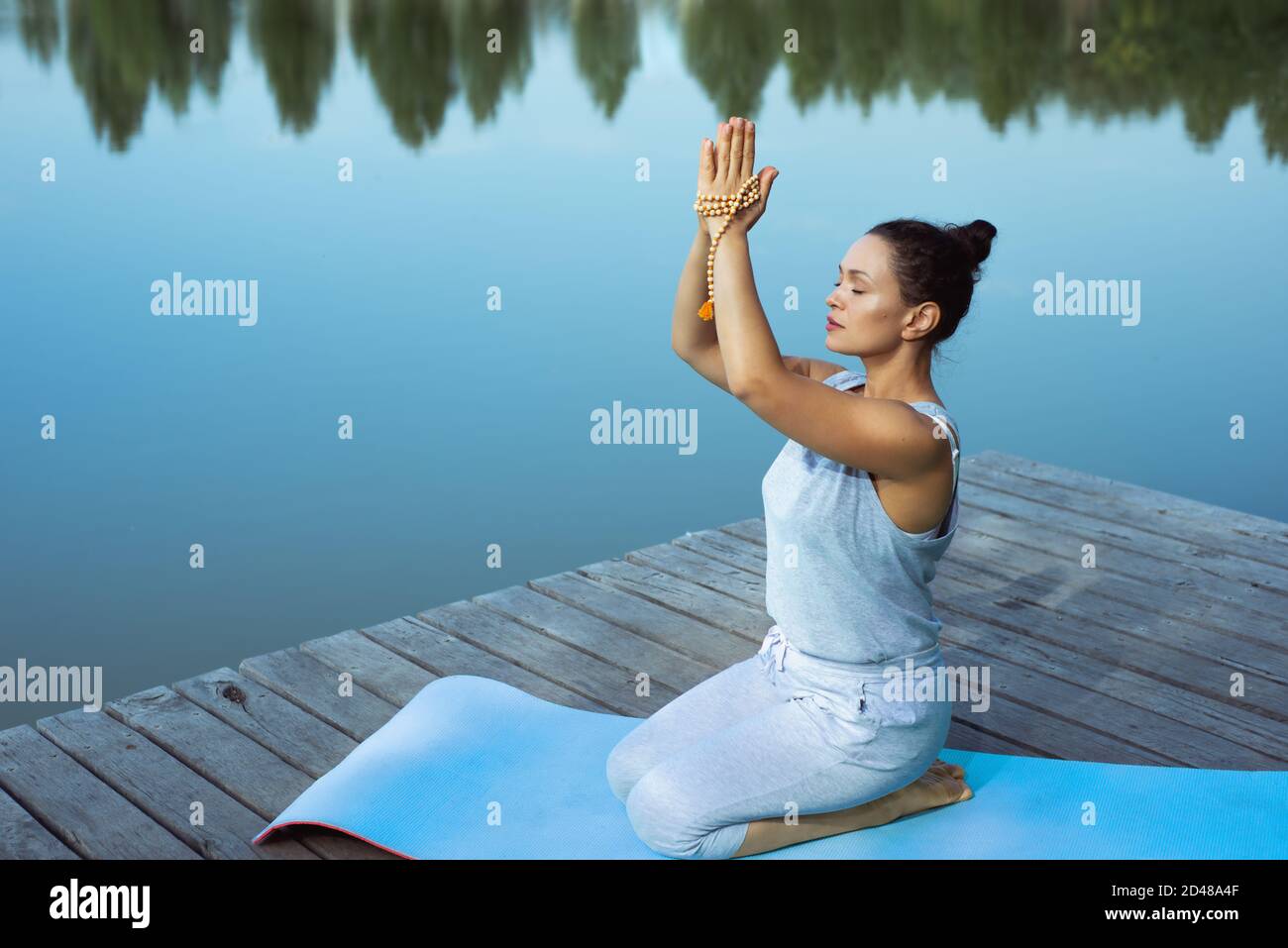 Hands folded sunrise hi-res stock photography and images - Alamy