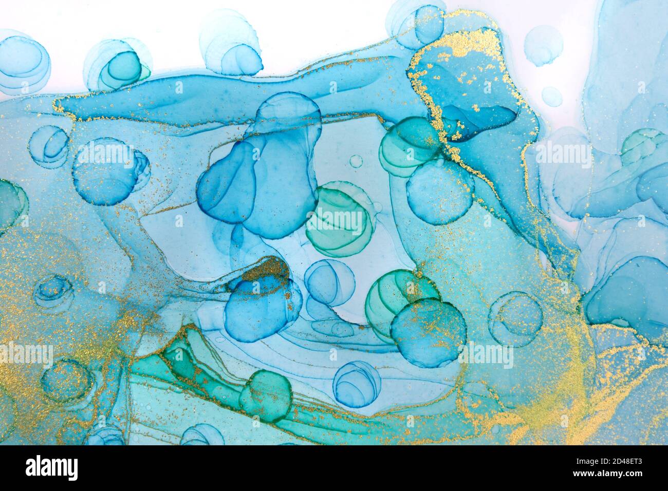 Transparent blue and gold watercolor drops on white background. Bubbles ...