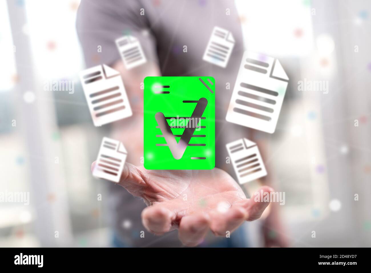 Document validation concept above the hand of a man in background Stock ...