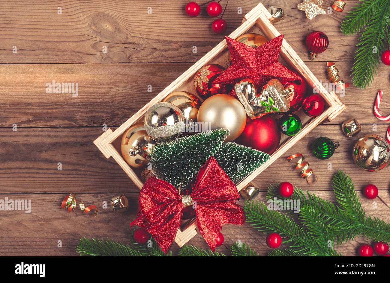 box with Christmas toys - bow, ball, star, ribbon, Christmas tree on ...