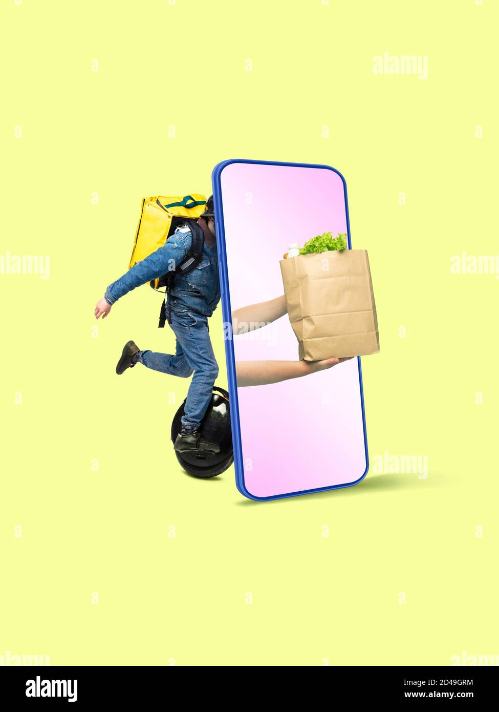 Tasty. Handsome delivery man giving order right from smartphone's ...