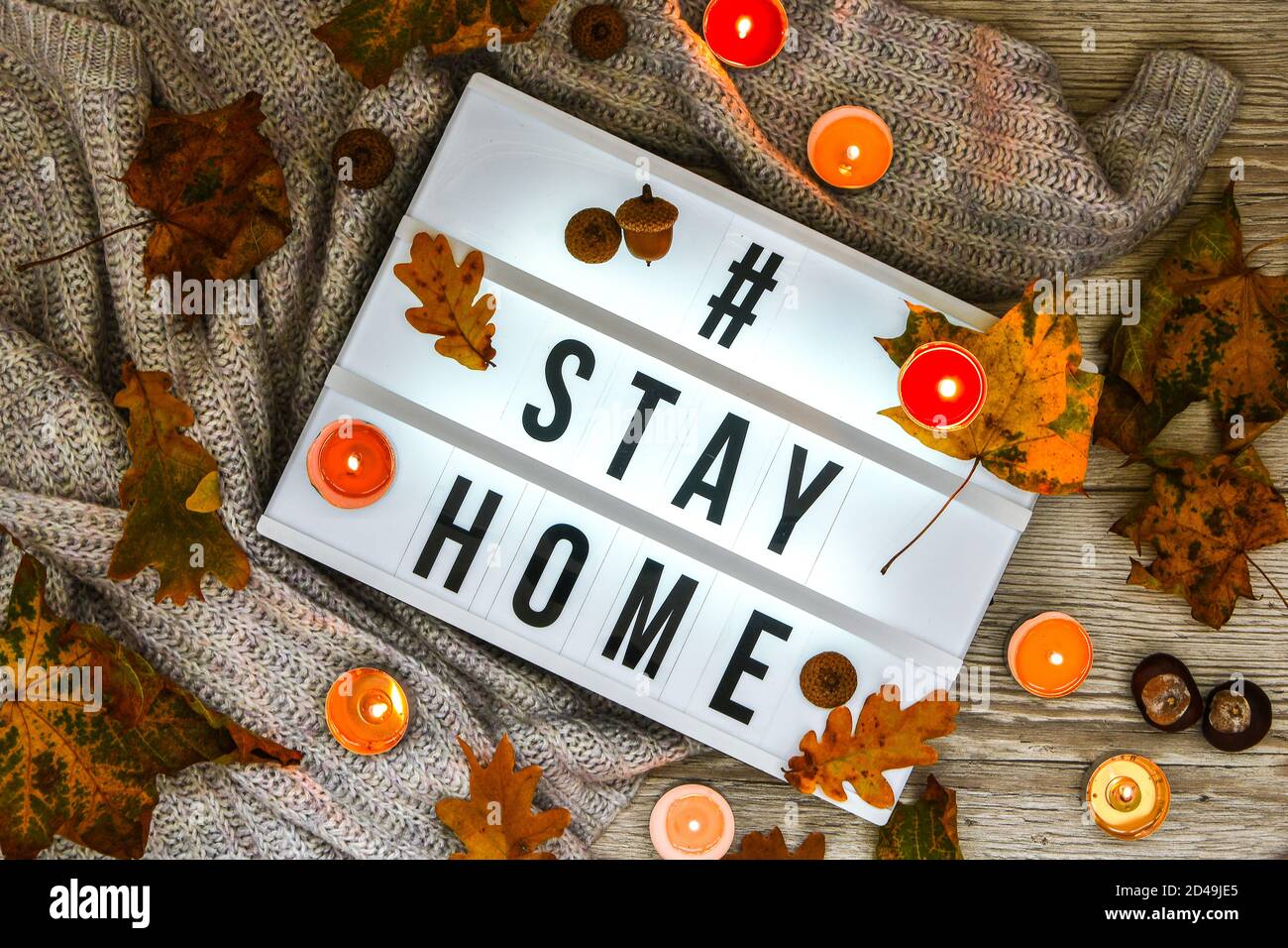 Hashtag Stay home. Text in white light box, with a background of ...