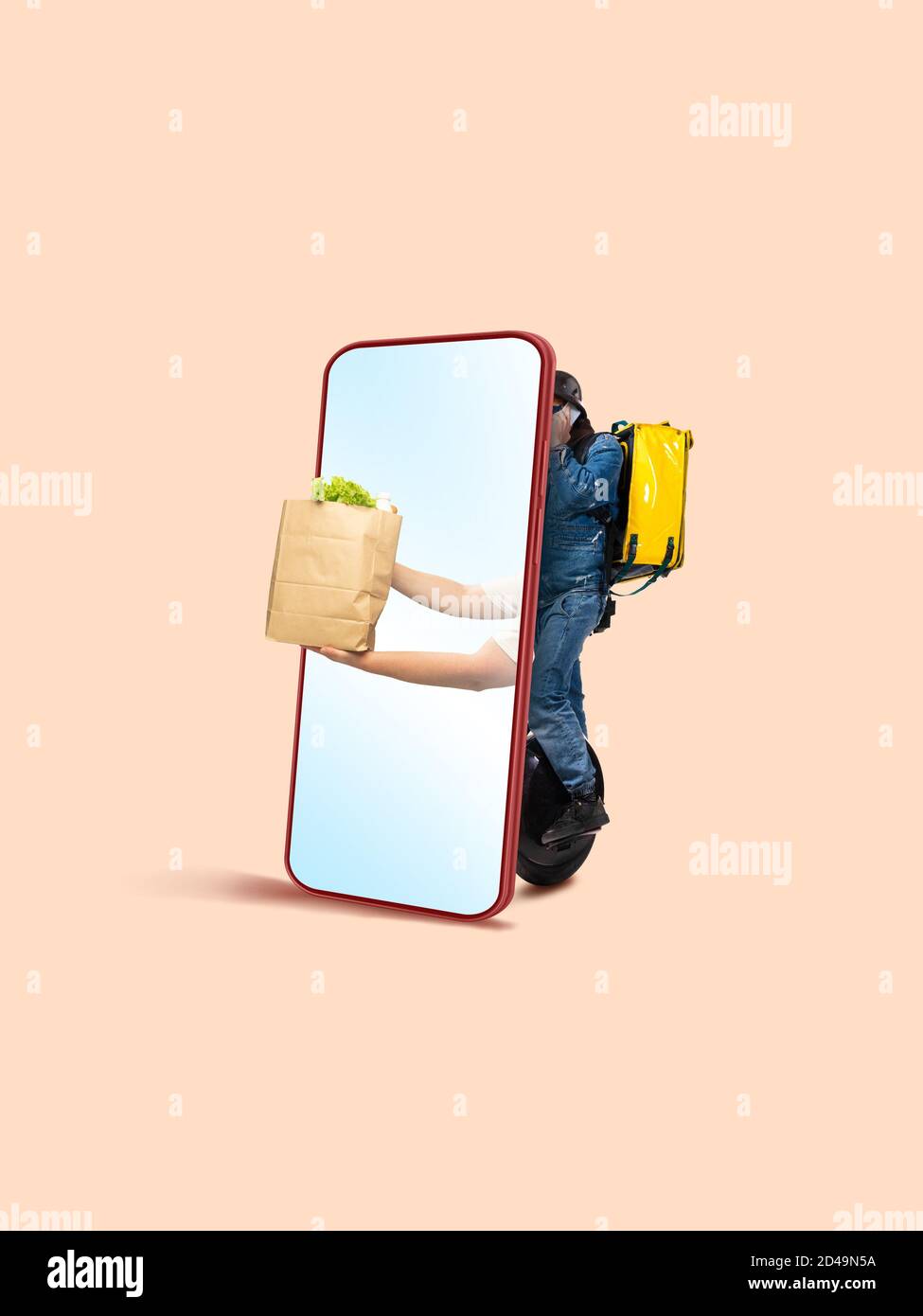 Tasty. Handsome delivery man giving order right from smartphone's ...