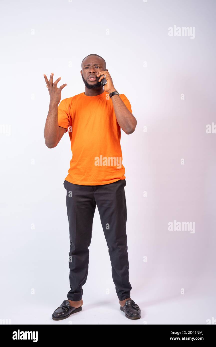 african making look distressed while making a phone call Stock Photo ...