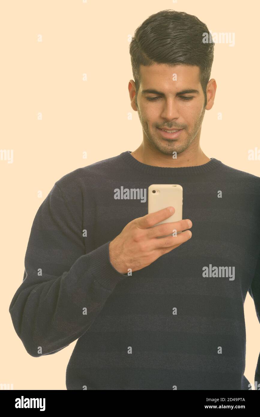 Young happy persian man using hi-res stock photography and images - Alamy