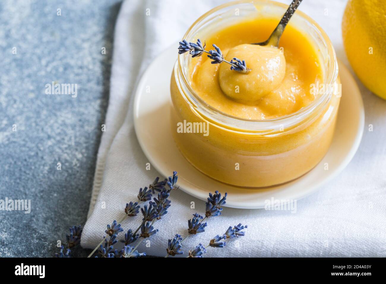 homemade lemon curd in a jar. delicious lemon cream or jam for a ...