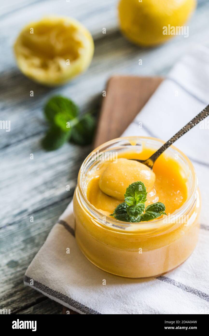homemade lemon curd in a jar. delicious lemon cream or jam for a ...