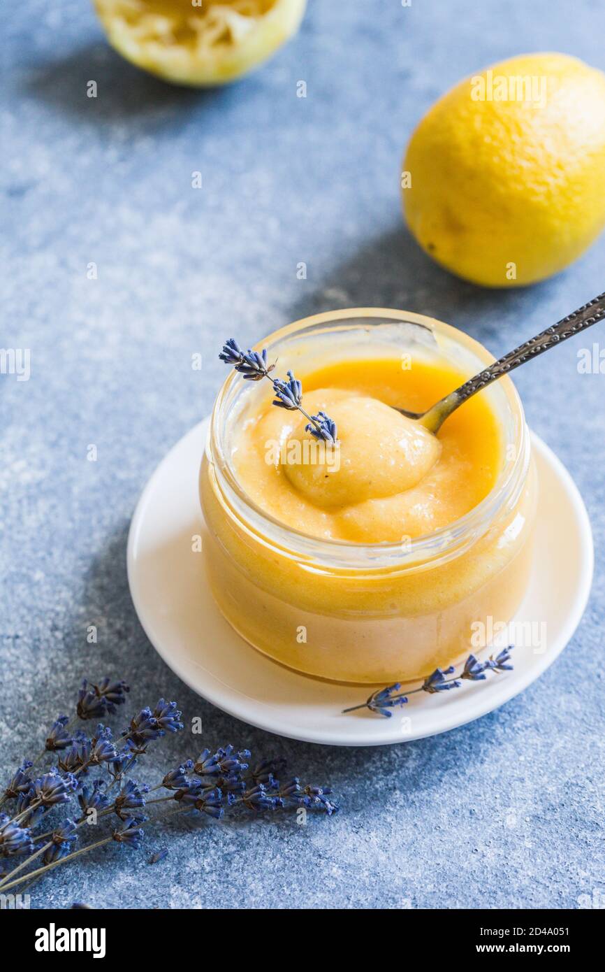 homemade lemon curd in a jar. delicious lemon cream or jam for a ...