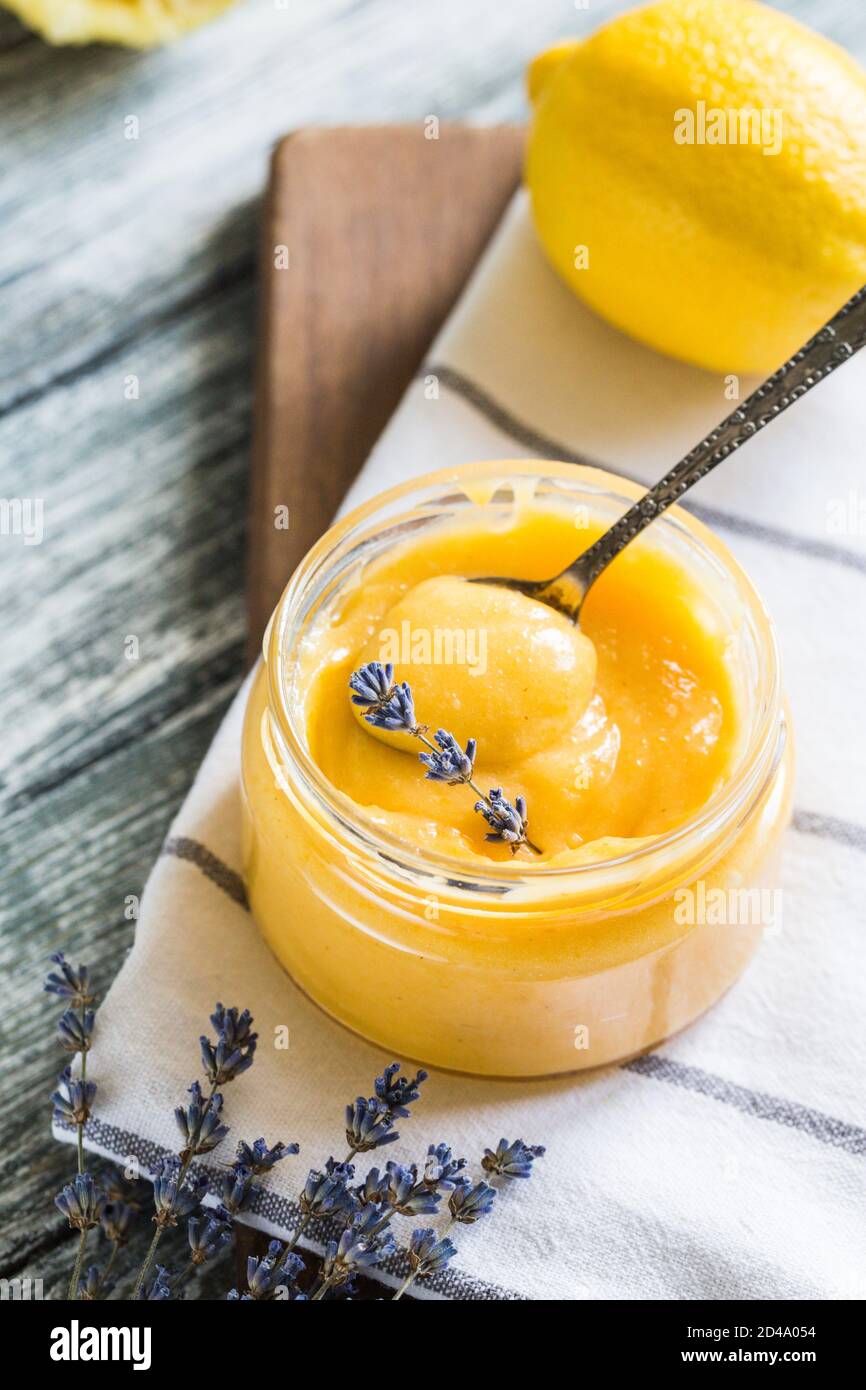 homemade lemon curd in a jar. delicious lemon cream or jam for a ...