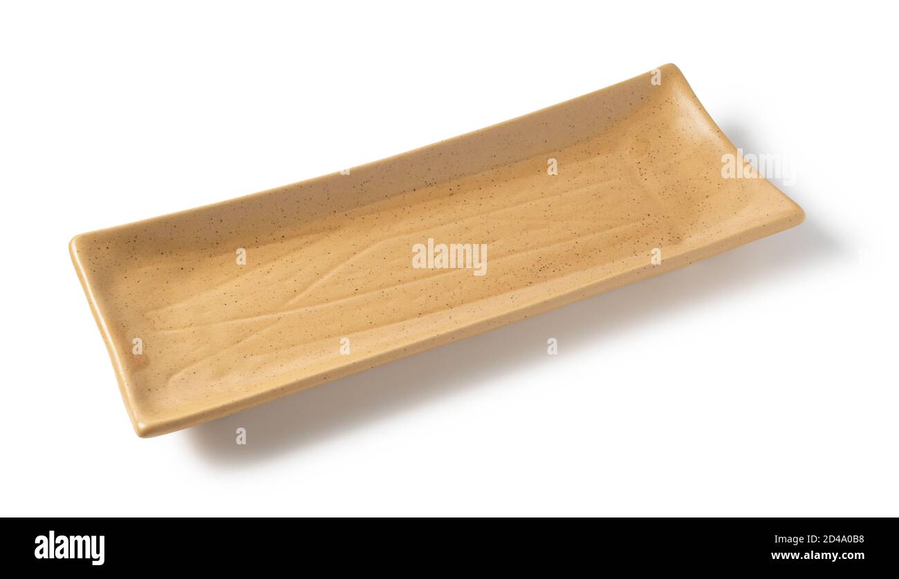 A Japanese-style plate placed on a white background shot diagonally ...