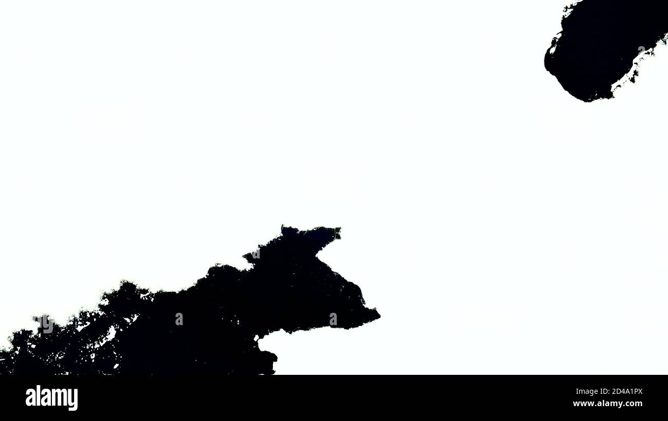 Photo of black paint spreads on white surface Stock Photo - Alamy