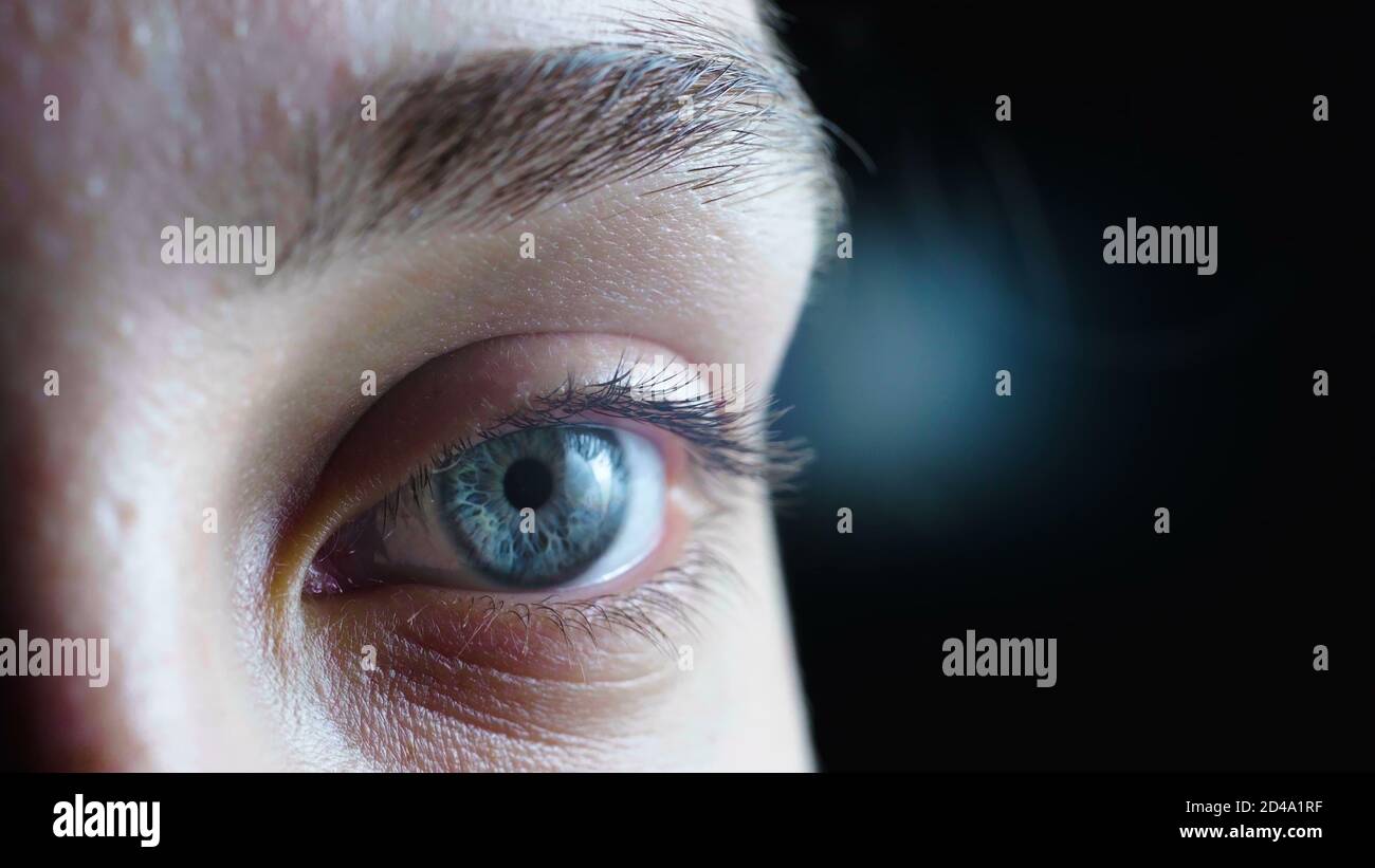 Photo of the grey woman's blinking eye Stock Photo - Alamy