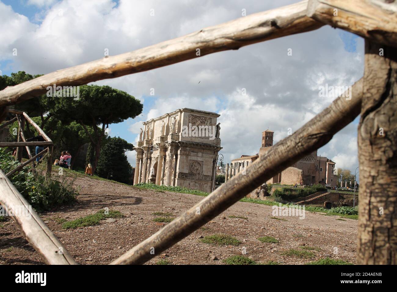 View of The Arch of Constantine from a wooden fence in Rome, Italy ...