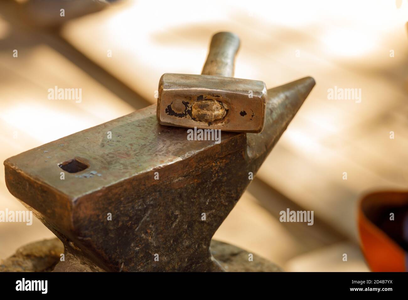 the hammer lies on the anvil. view from above Stock Photo - Alamy