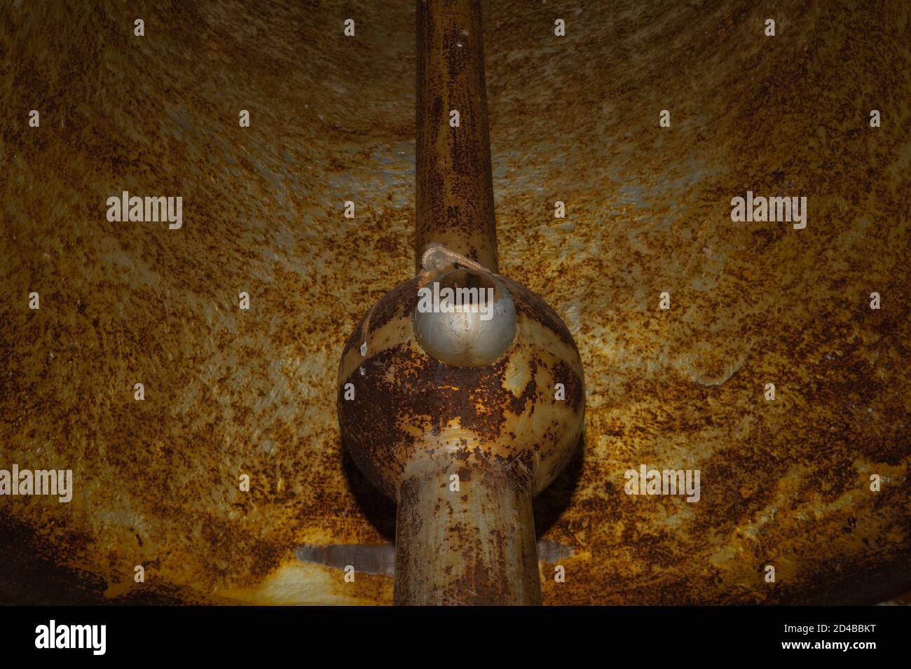 Bell clapper close up. inside the old rusty bell Stock Photo - Alamy