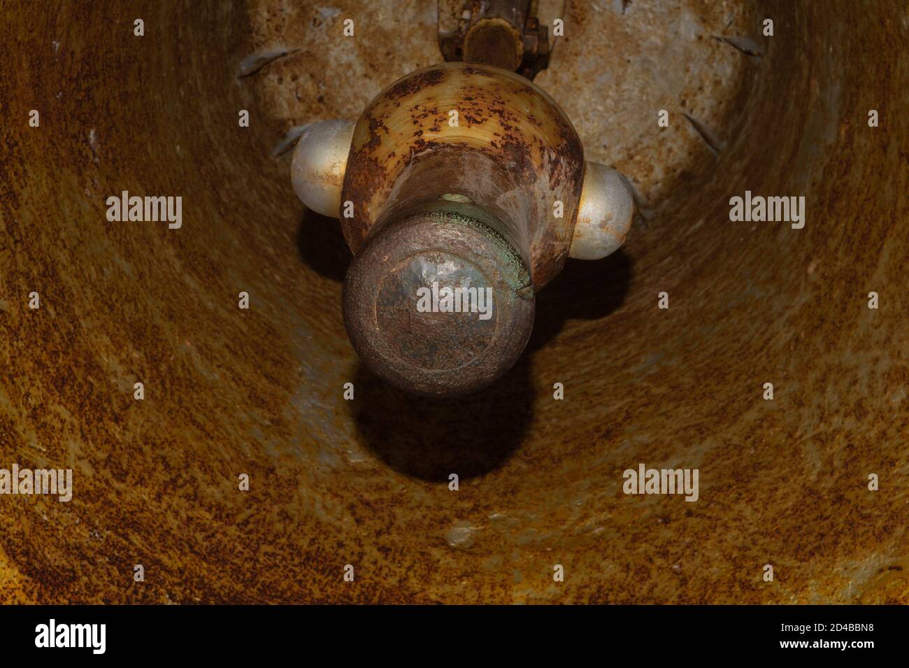 Bell clapper close up. inside the old rusty bell Stock Photo - Alamy