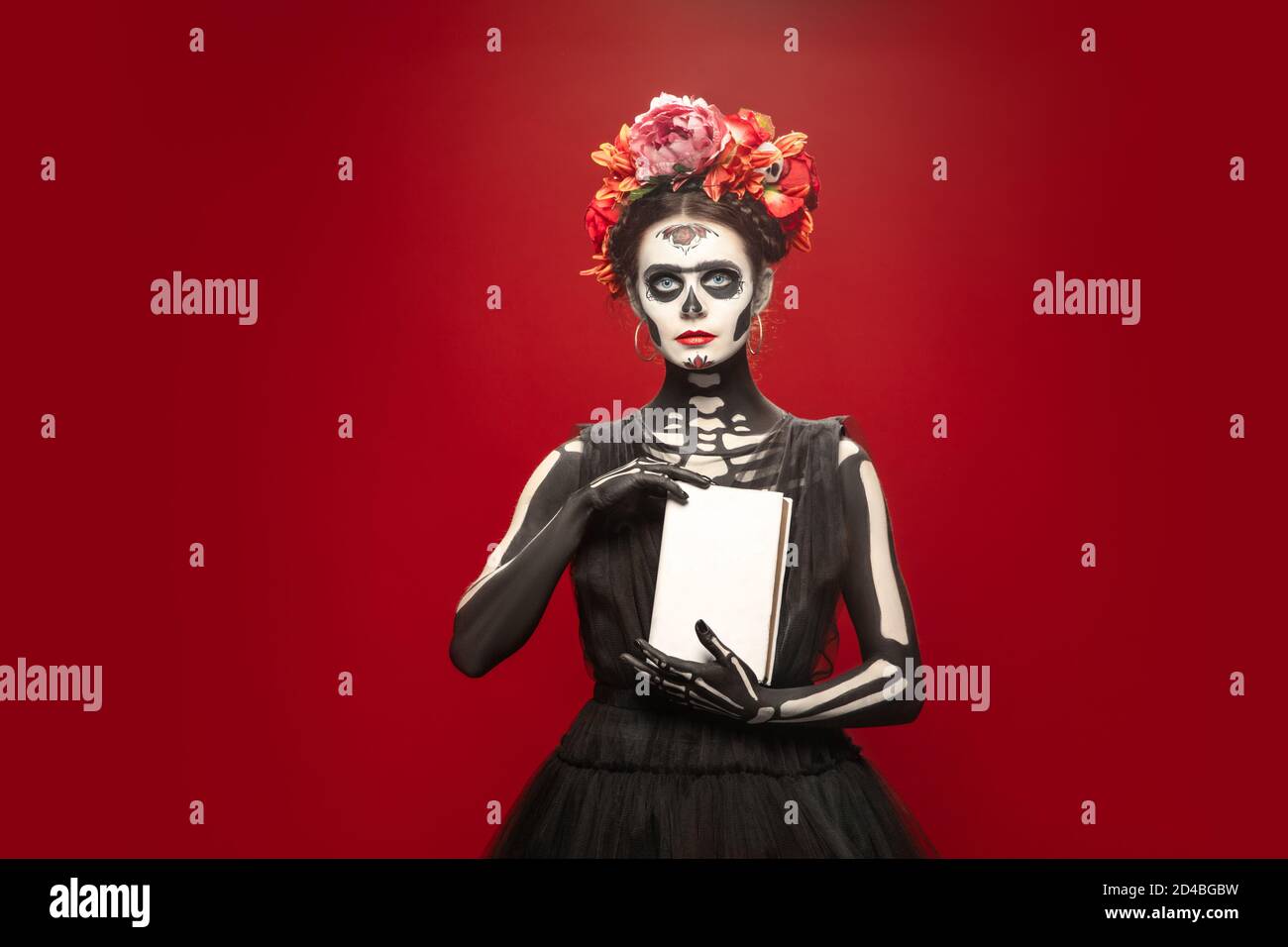 Book. Young girl like Santa Muerte Saint death or Sugar skull with ...