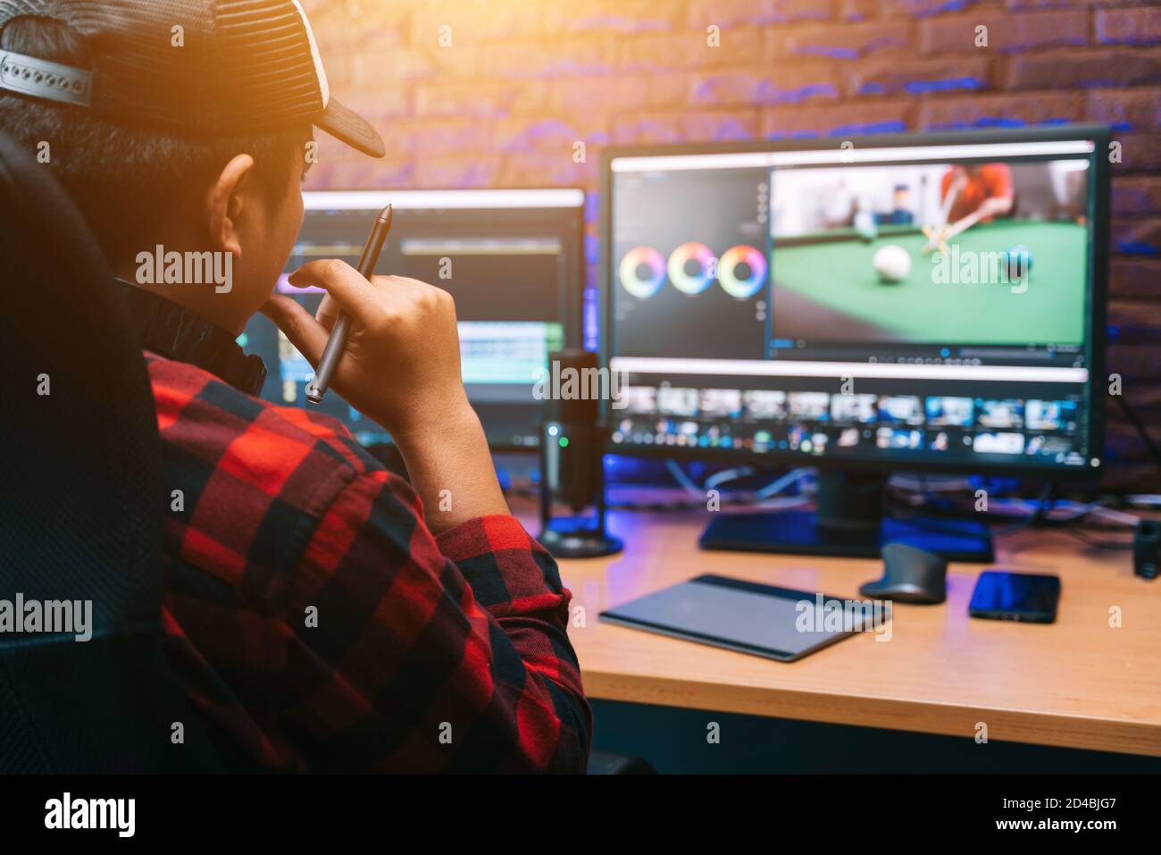 Asian creative man and editor video work Vlogger editing video create ...