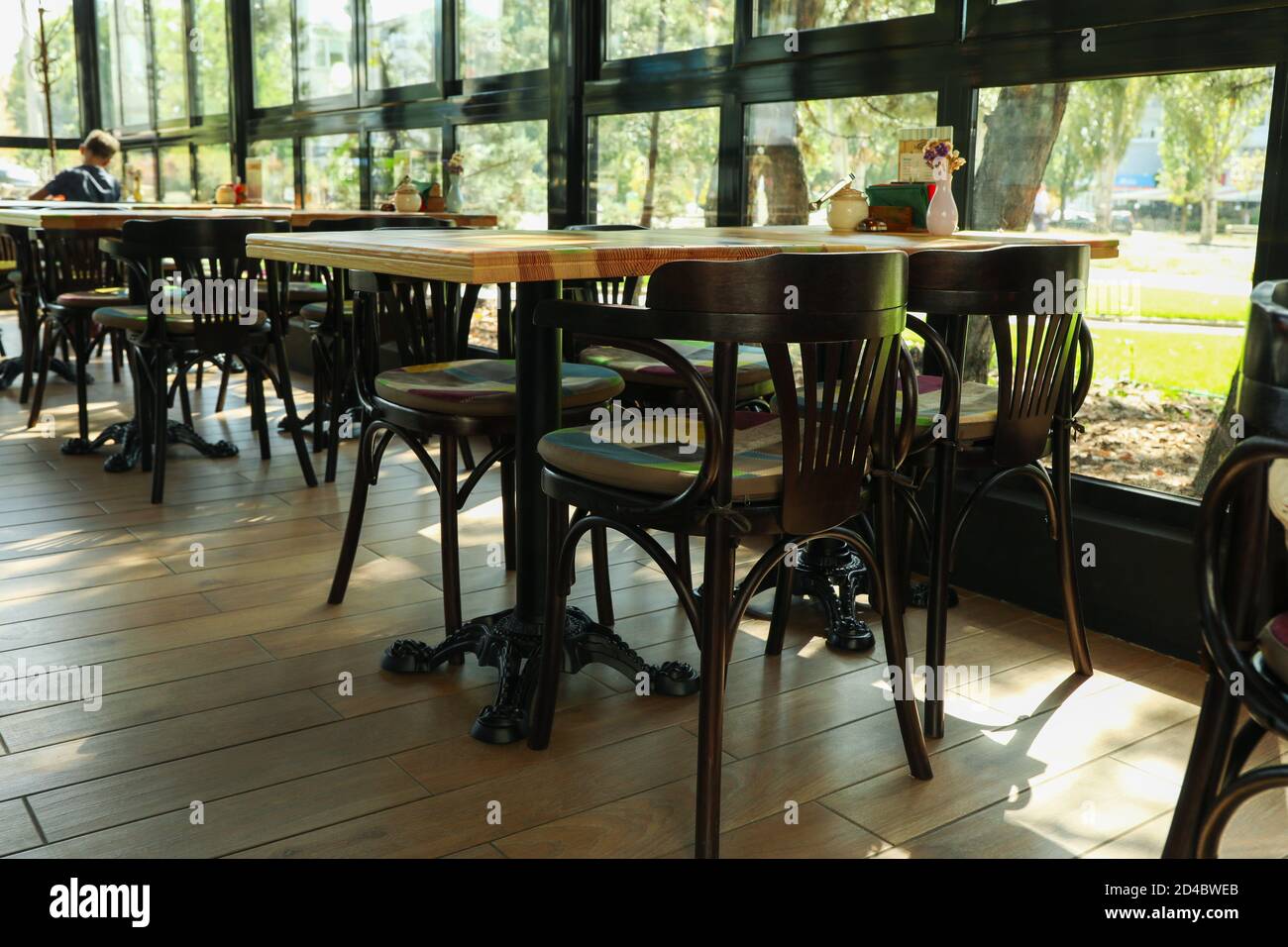 Interior of restaurant with vintage chairs and tables Stock Photo - Alamy