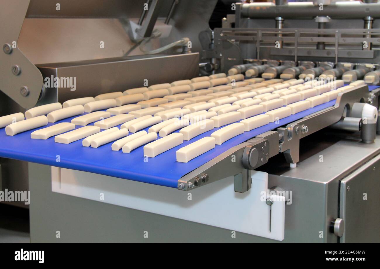 Food Processing Machine Producing a Variety of Shapes Stock Photo - Alamy