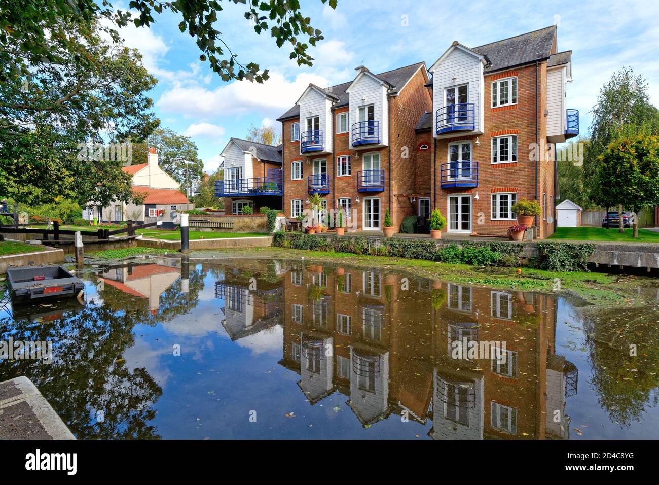 Modern apartments on the River Wey navigation canal at Thames Lock ...