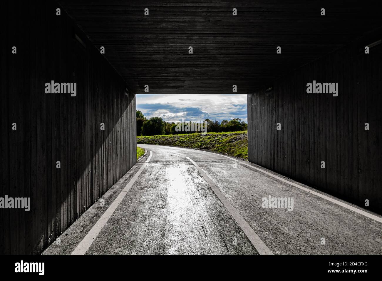 Light and landscape at the end of a dark square tunnel Stock Photo - Alamy