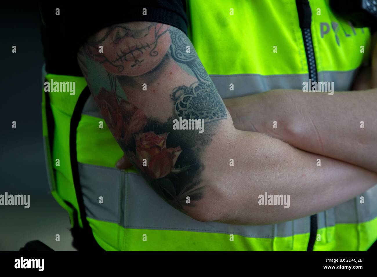 Female Police Woman With Tattoos At Amsterdam The Netherlands 25-9-2020 ...