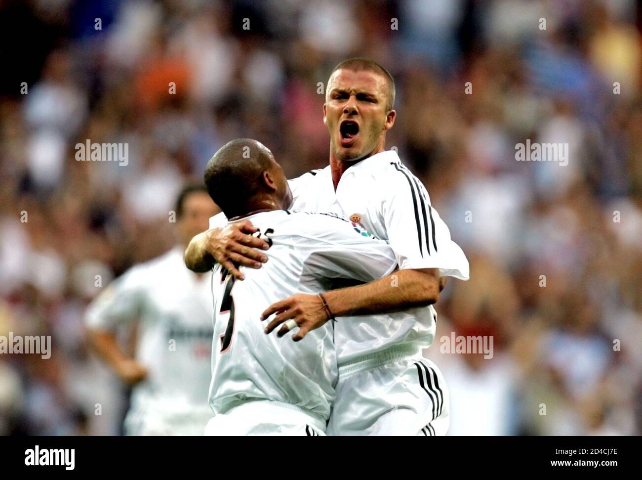 Real madrids david beckham and roberto carlos hi-res stock photography ...