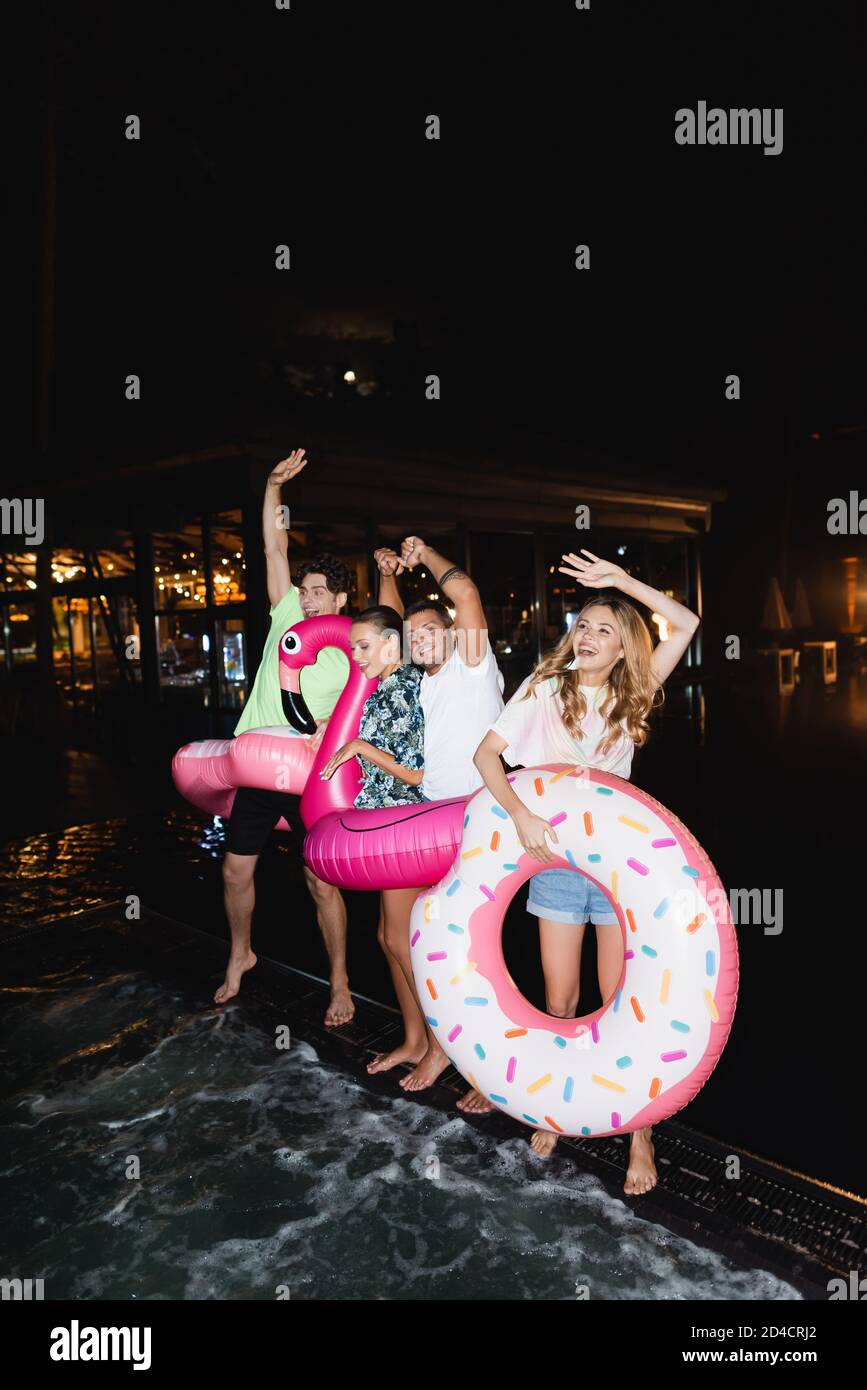 Friends dancing swimming pool party hi-res stock photography and images ...