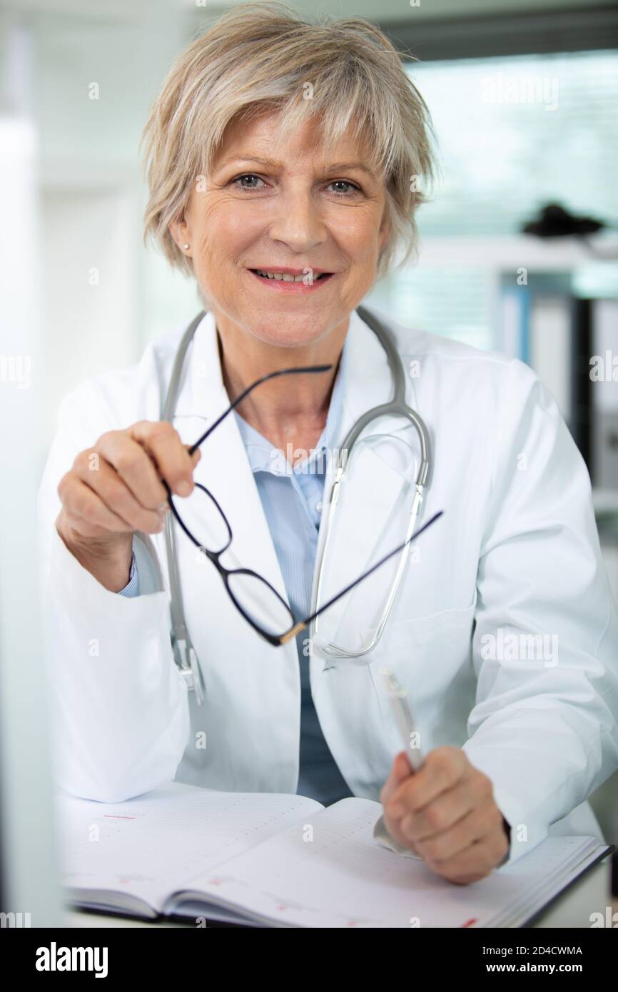 female doctor looking at the camera Stock Photo - Alamy
