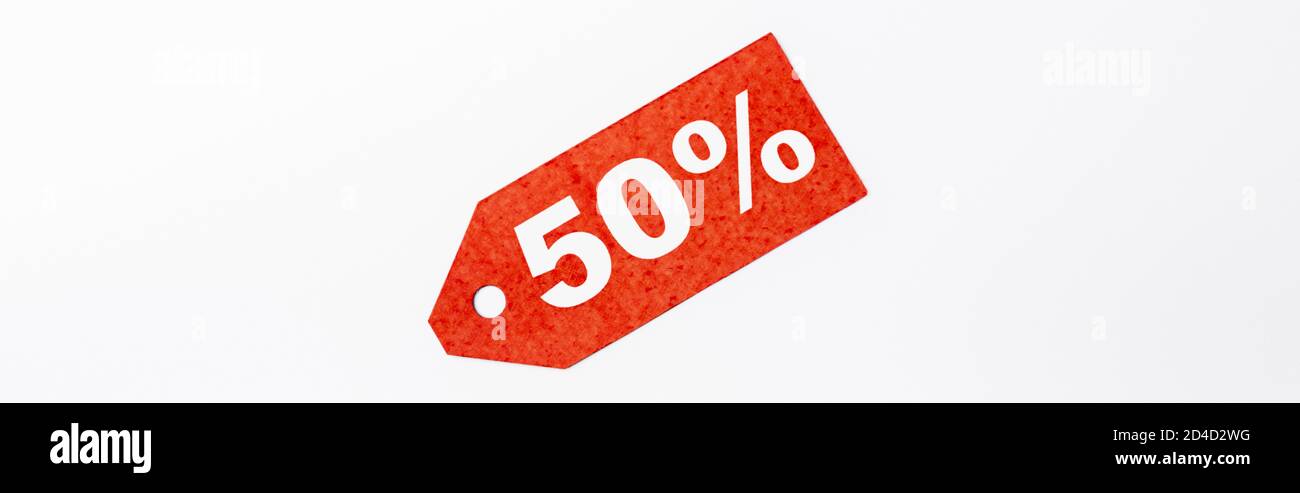 Panoramic crop of red price tag with 50 percent signs on white ...