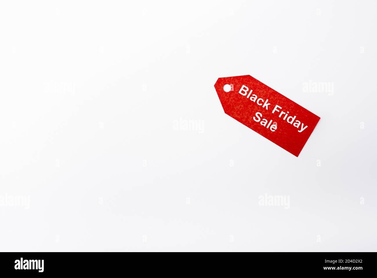 Top view of price tag with black friday sale lettering on white ...