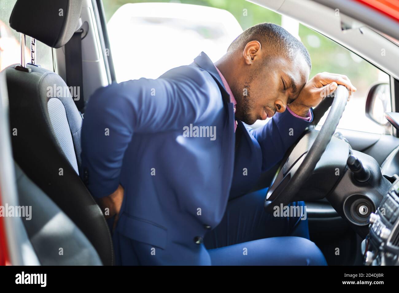 Car Accident Injury. Back Pain While Driving Stock Photo - Alamy