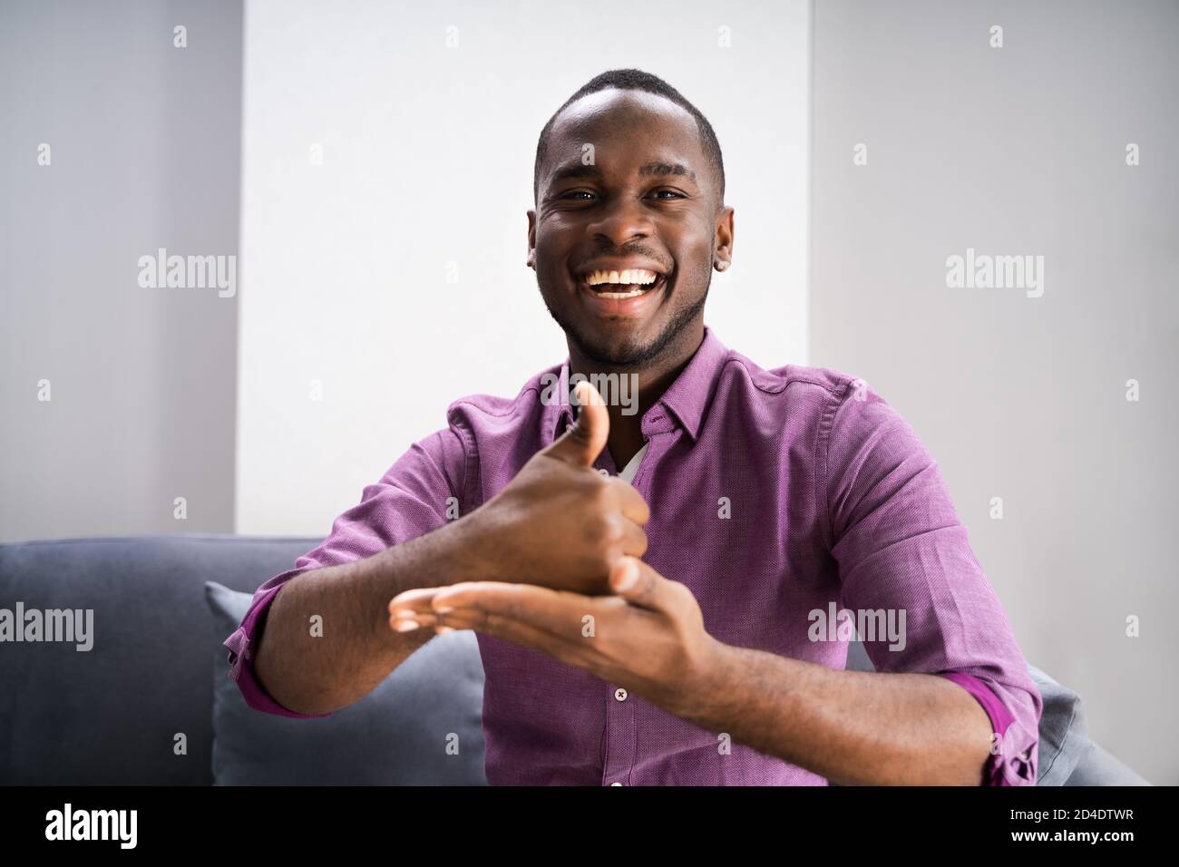 African American Deaf Man Using Sign Language Stock Photo - Alamy