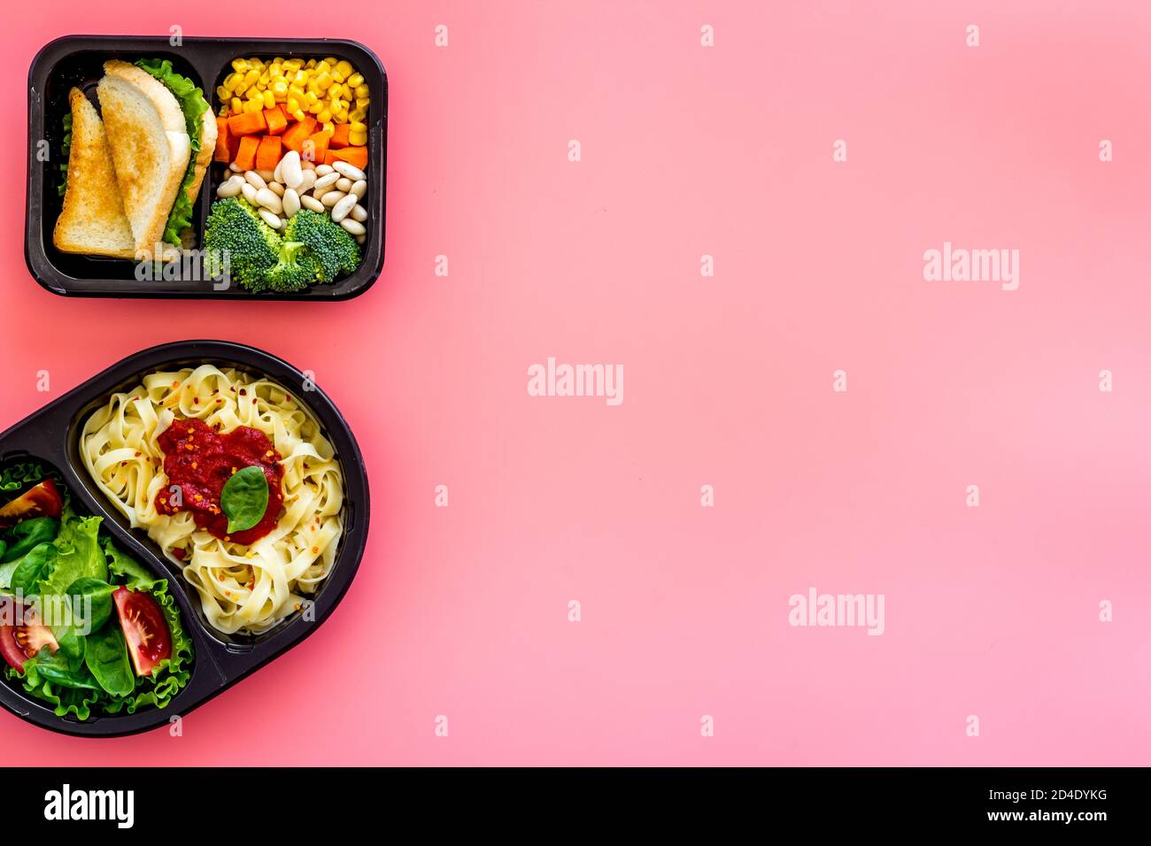 Lunch boxes with meal. Food delivery concept. Overhead view Stock Photo ...