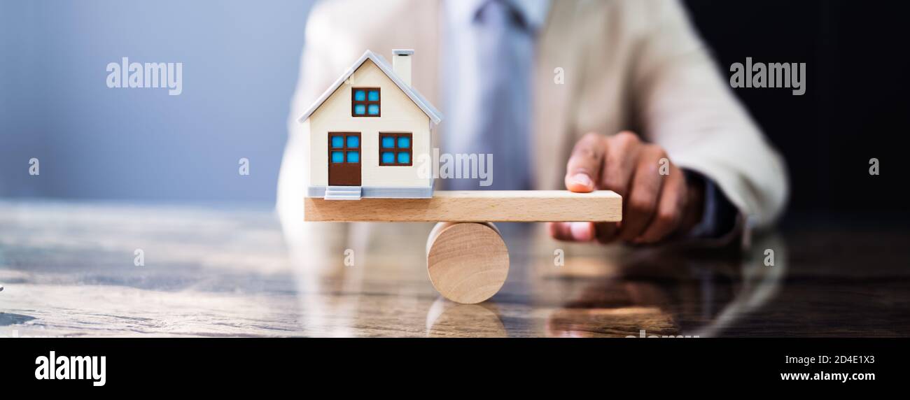 House balance hi-res stock photography and images - Alamy