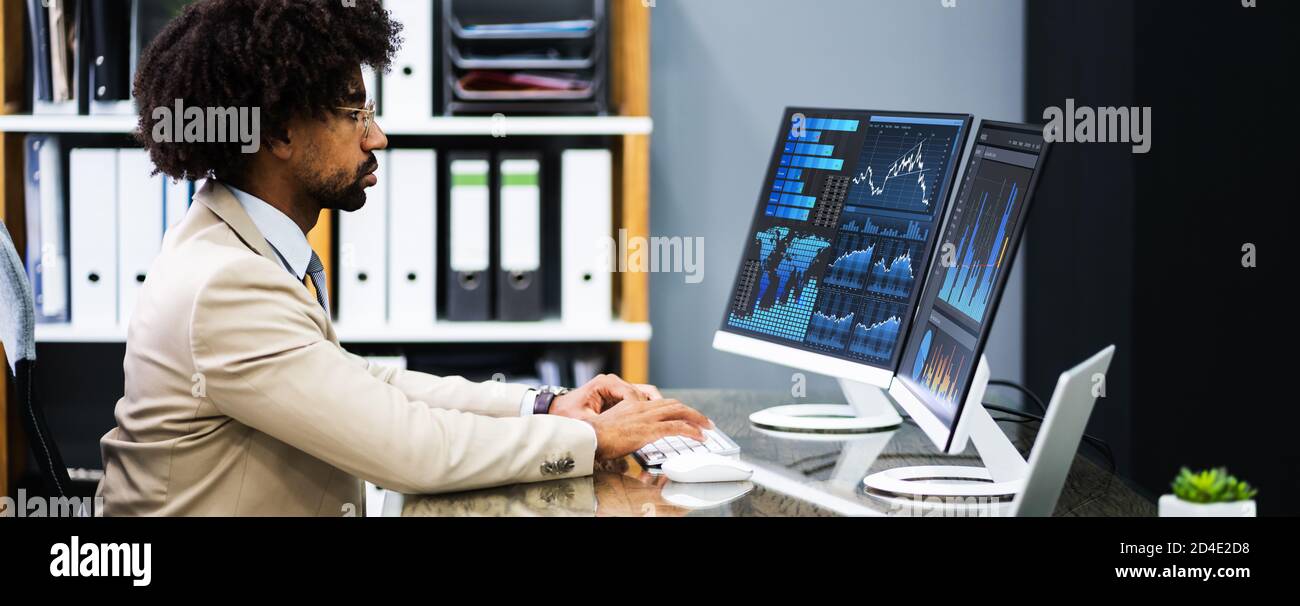 Business Data Analyst Using Computer. African American Advisor Stock ...
