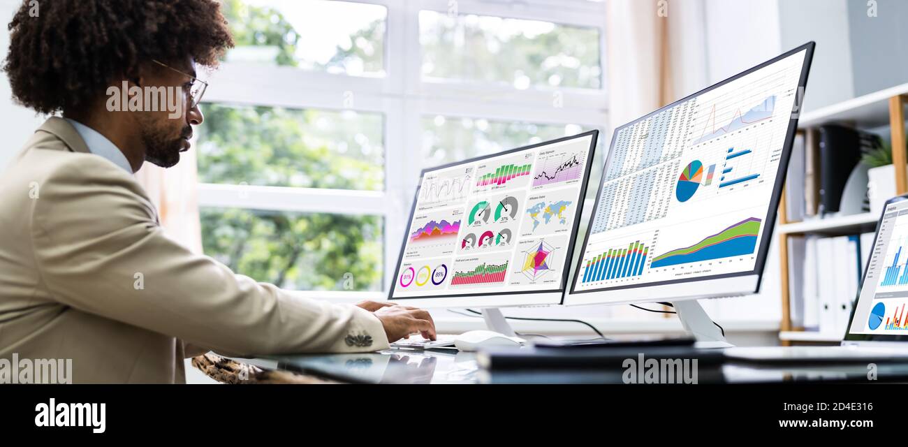 Business Data Analyst Using Computer. African American Advisor Stock ...