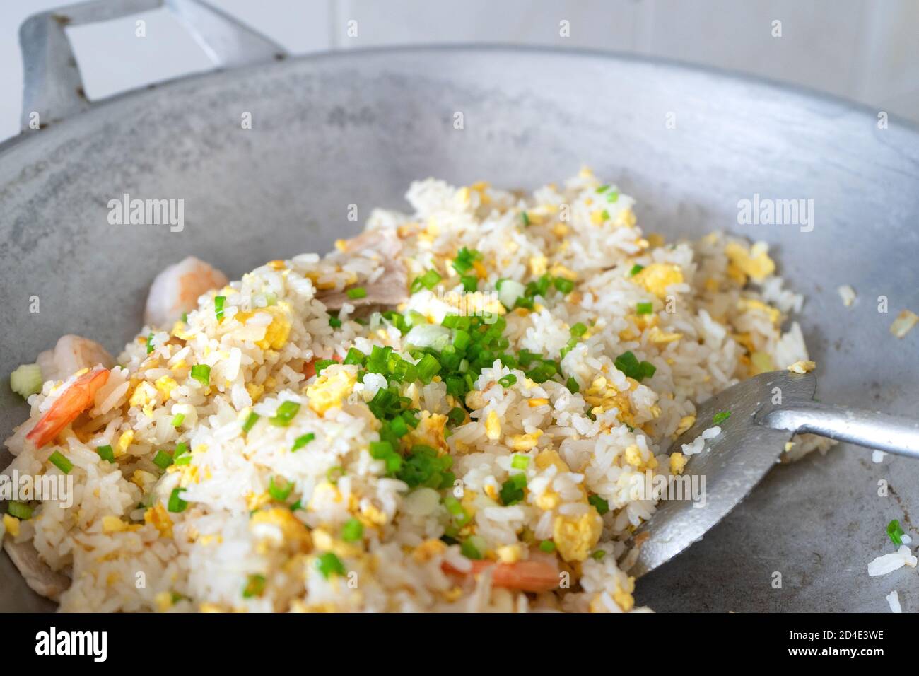fried rice on hot aluminum pan for lunch Stock Photo - Alamy