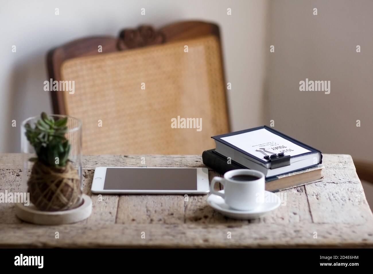 A tranquil home office space decorated with sustainable natural decor ...