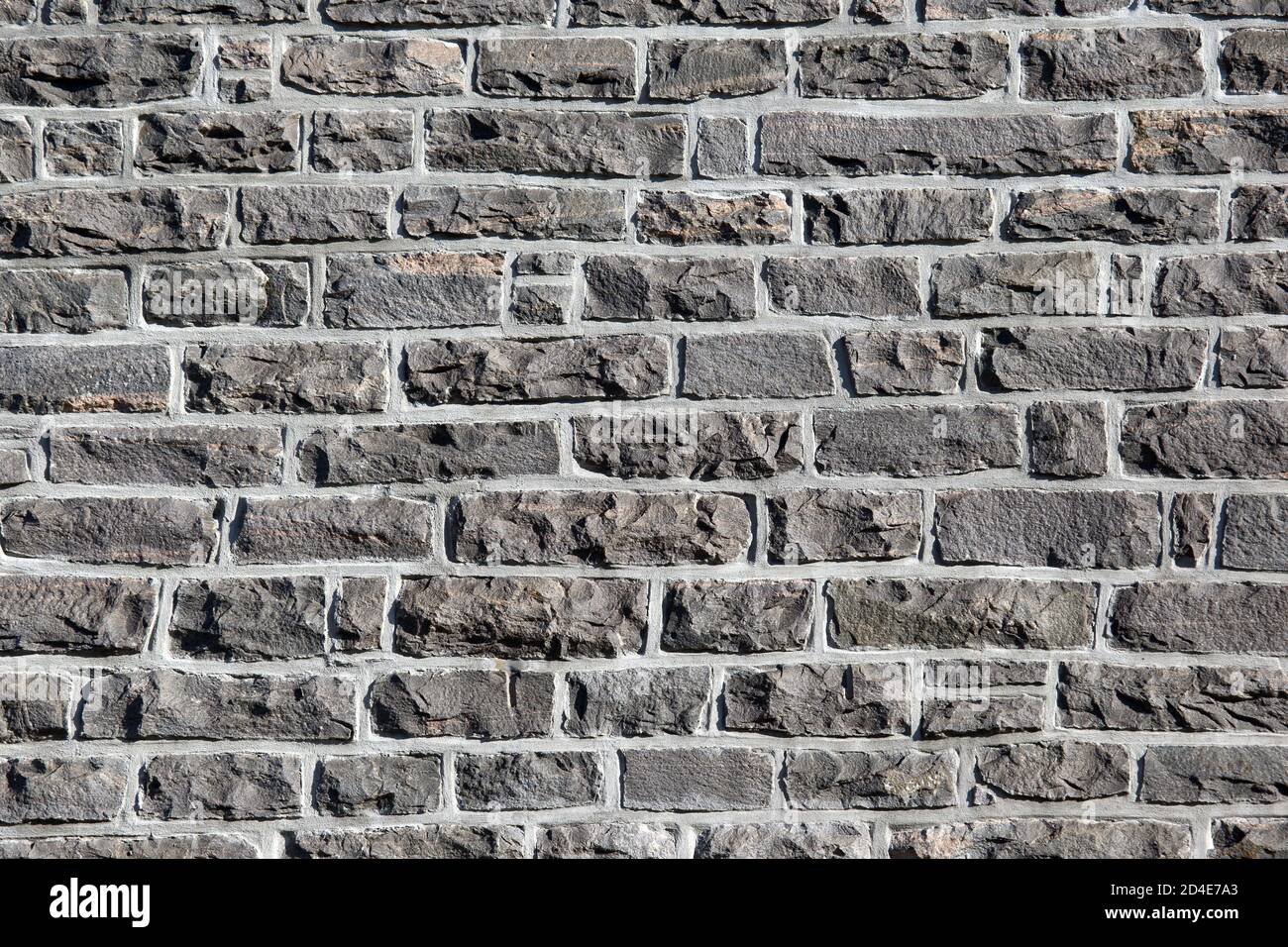 wall of gray brick masonry Stock Photo - Alamy