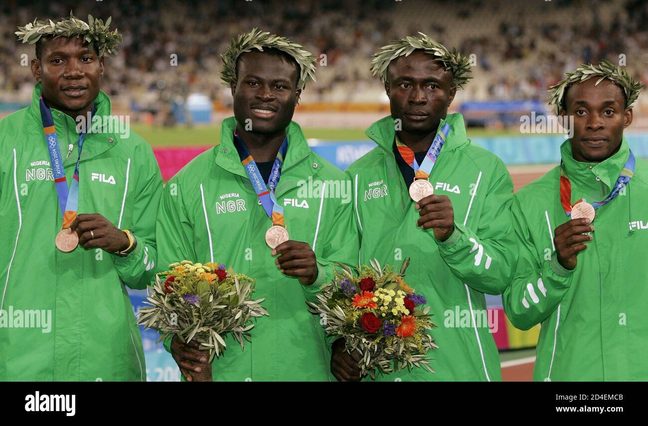 Athens 4x100 medals hi-res stock photography and images - Alamy