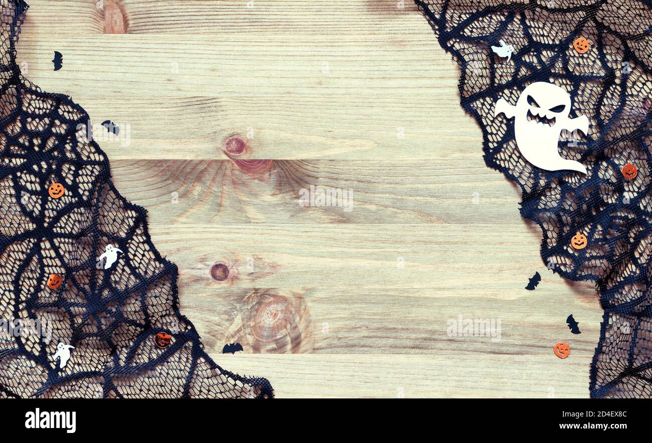 Halloween festive background. Spider web, cobweb lace and spooky ghosts ...
