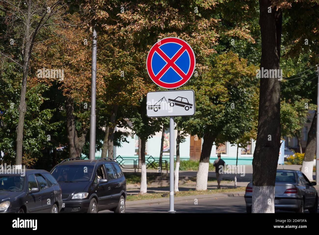 Cars stopping stop sign hi-res stock photography and images - Alamy