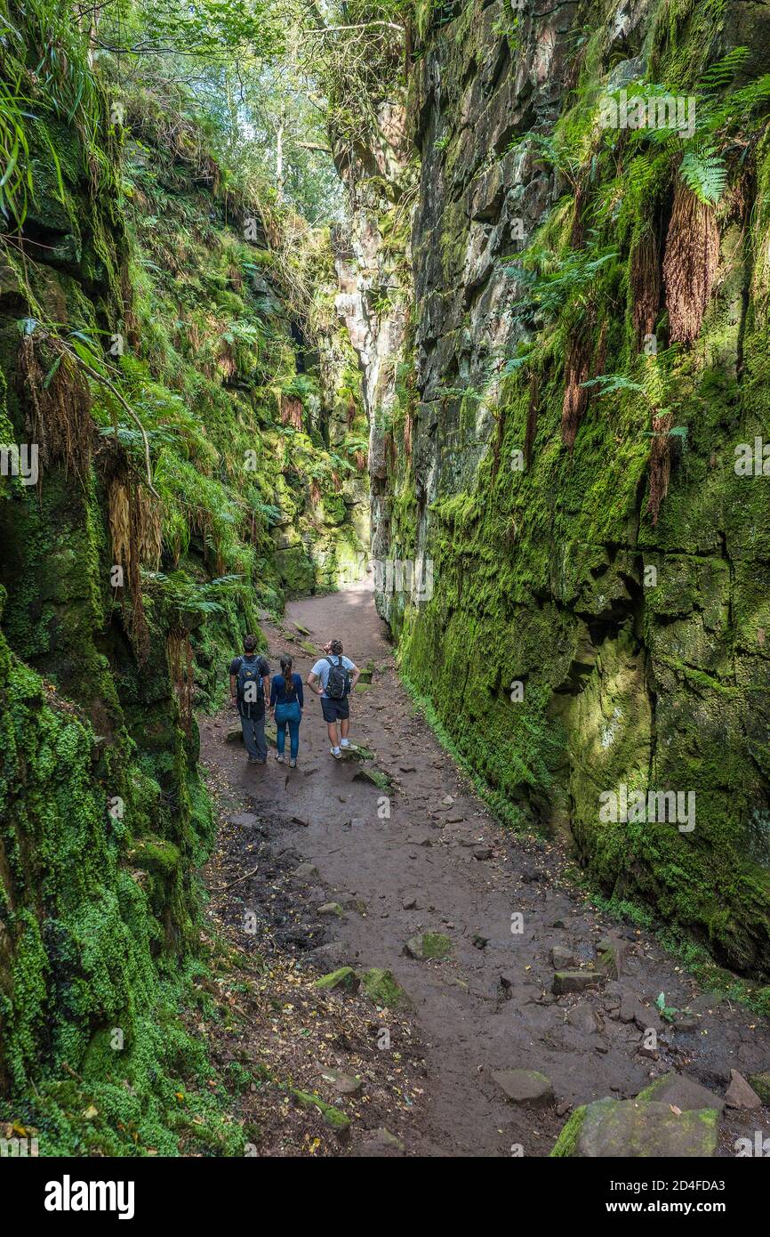 Peak District National Park.. Walkers in Lud's / Lud Church - a natural ...