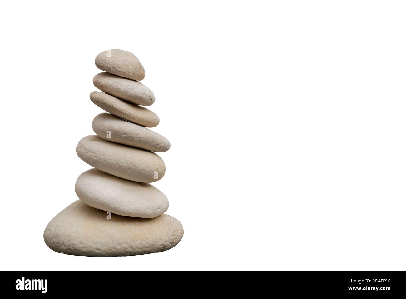 Stack of pebbles in an unstable state. A pyramid made of flat stones ...