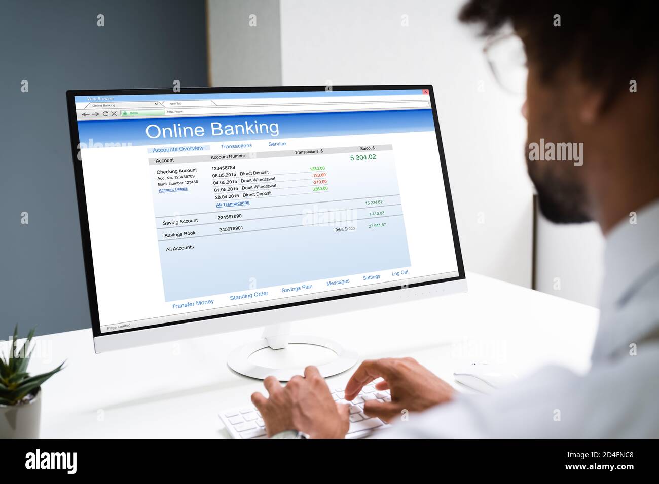 African American Using Online Bank Account Through Internet Stock Photo ...