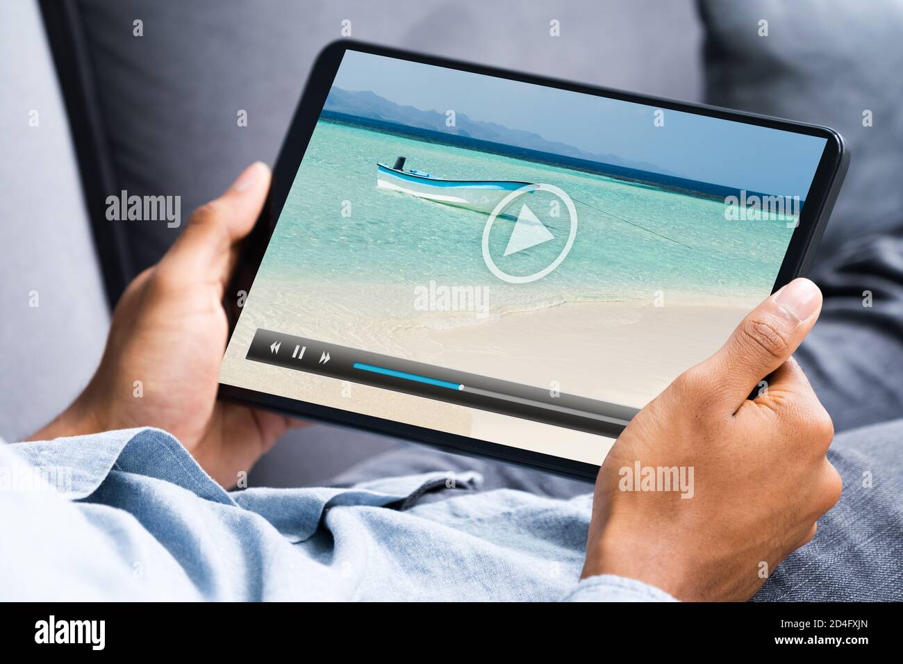 Movie playing tablet hi-res stock photography and images - Alamy