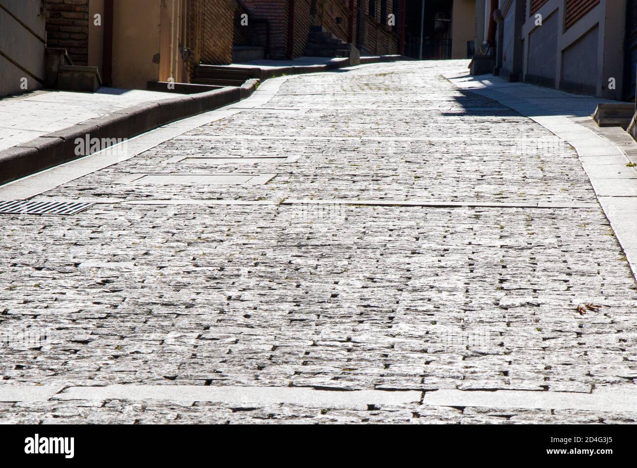 Stone way and road in old town of Tbilisi, Georgia Stock Photo - Alamy