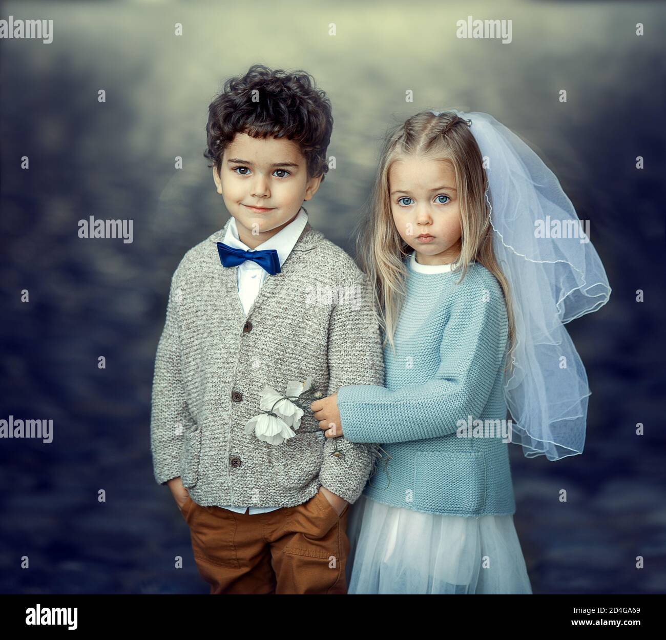 boy and girl dressed as bride and groom Stock Photo - Alamy